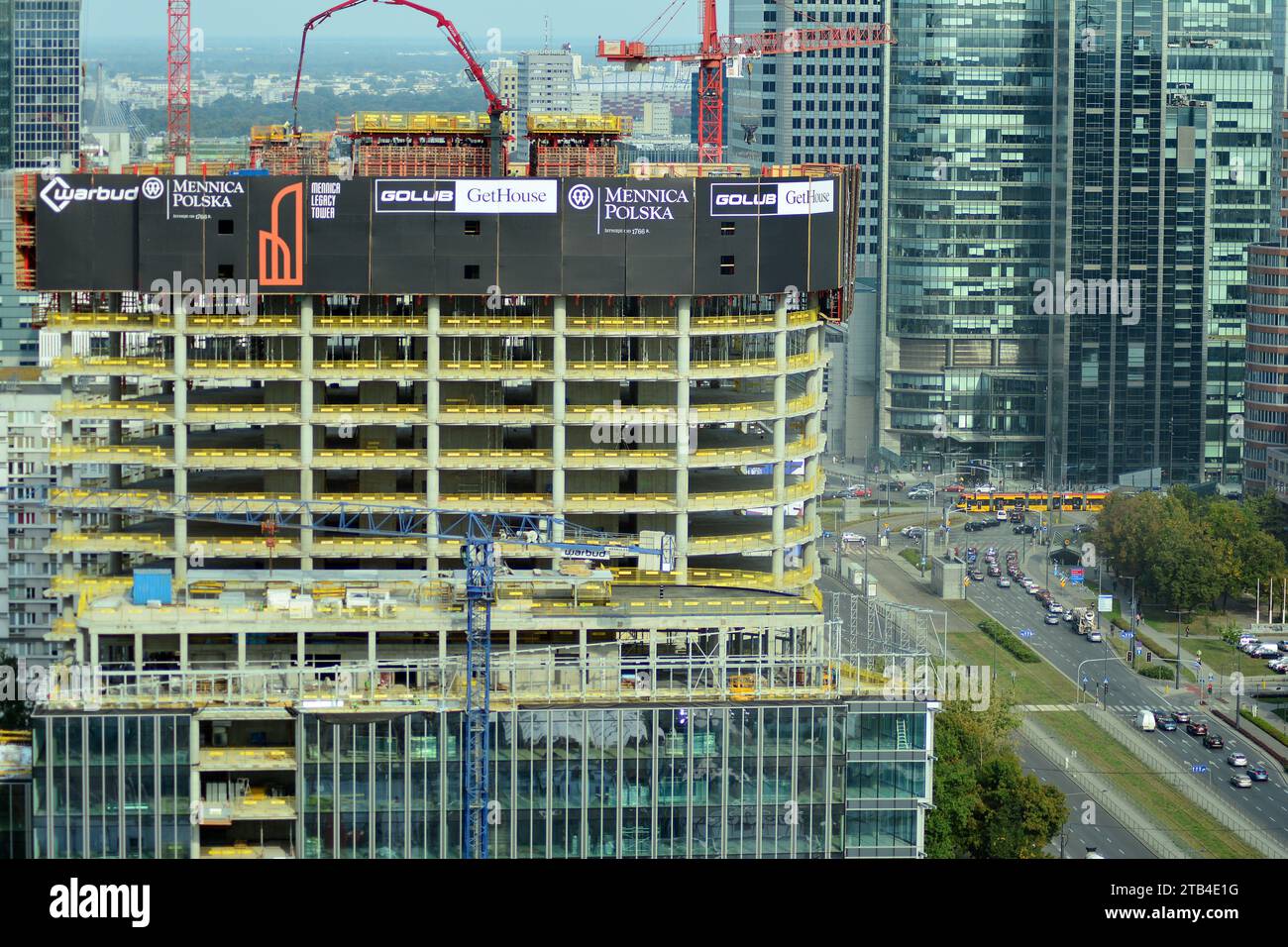 High rise building under construction. Installation of glass facade ...