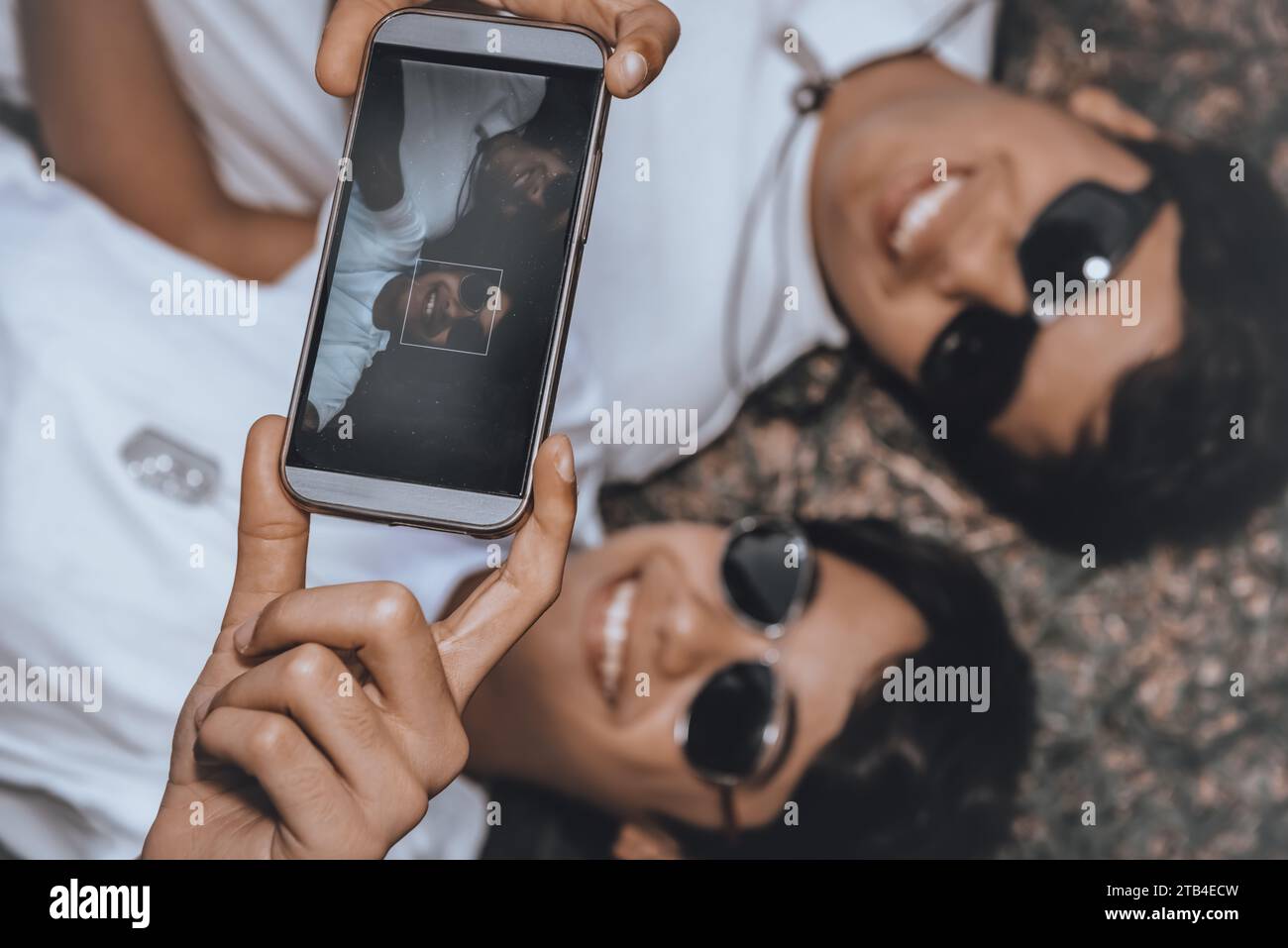 Two friends taking a selfie Stock Photo - Alamy