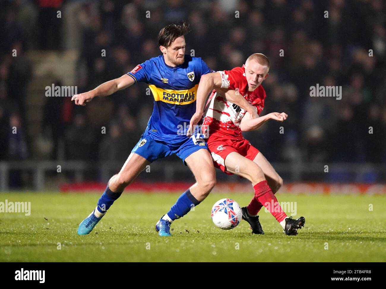 AFC Wimbledon's Armani Little and Ramsgate's Benny Bioletti battle for ...