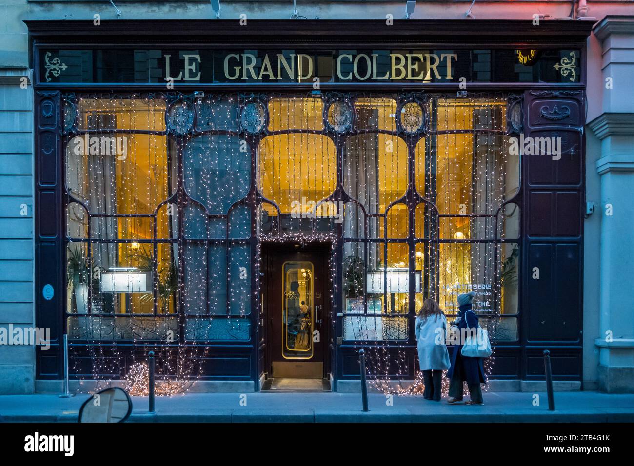 Paris, France, Tourists looking at Le Grand Colbert that is a famous ...