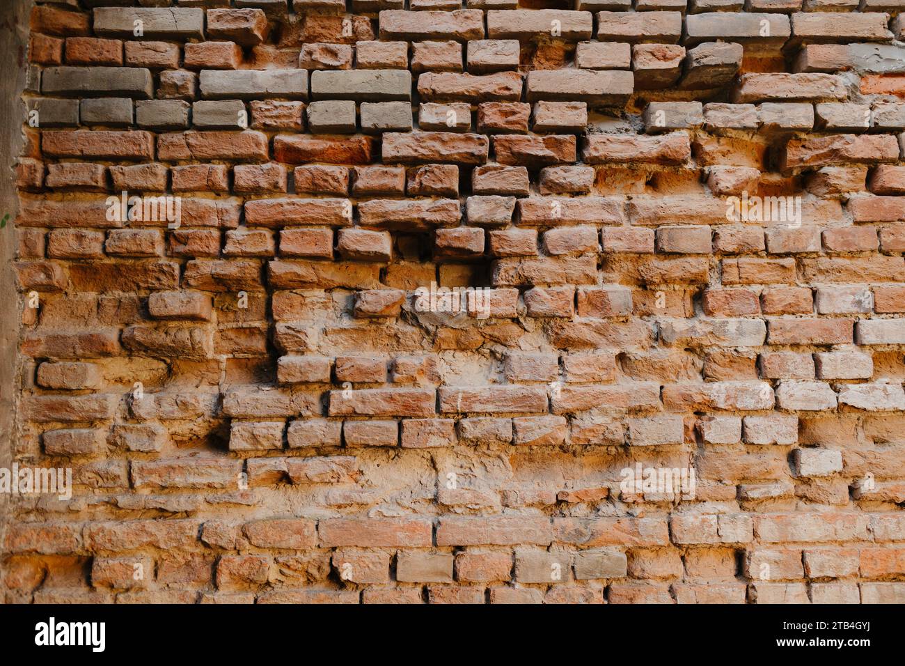 Old red brick wall. Brickwork from an old brick in a rustic style ...