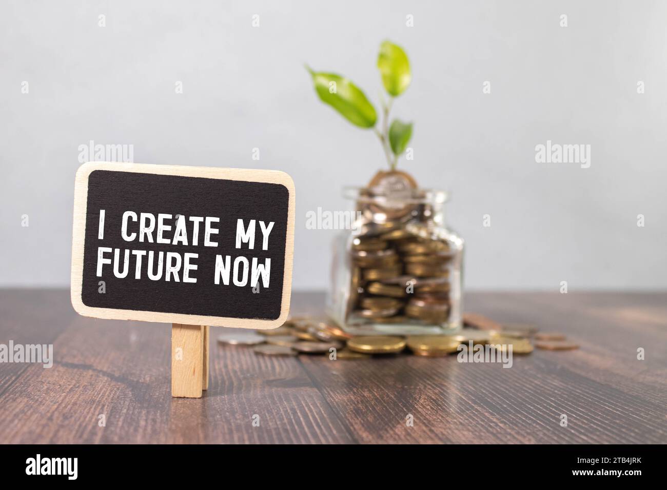 Text I CREATE MY FUTURE NOW on sticky notes with copy space and paper ...