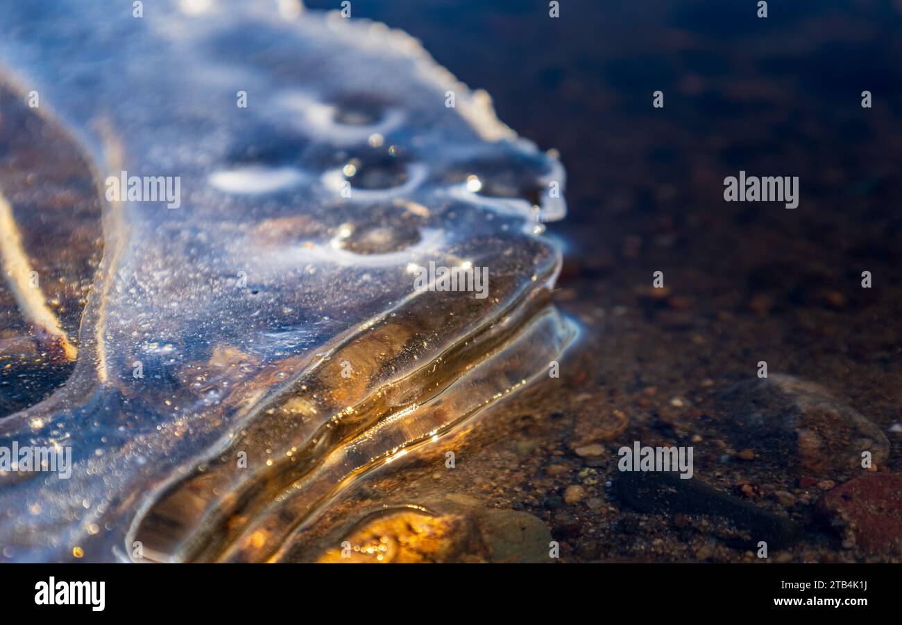 edge of ice forming on a lake Stock Photo - Alamy