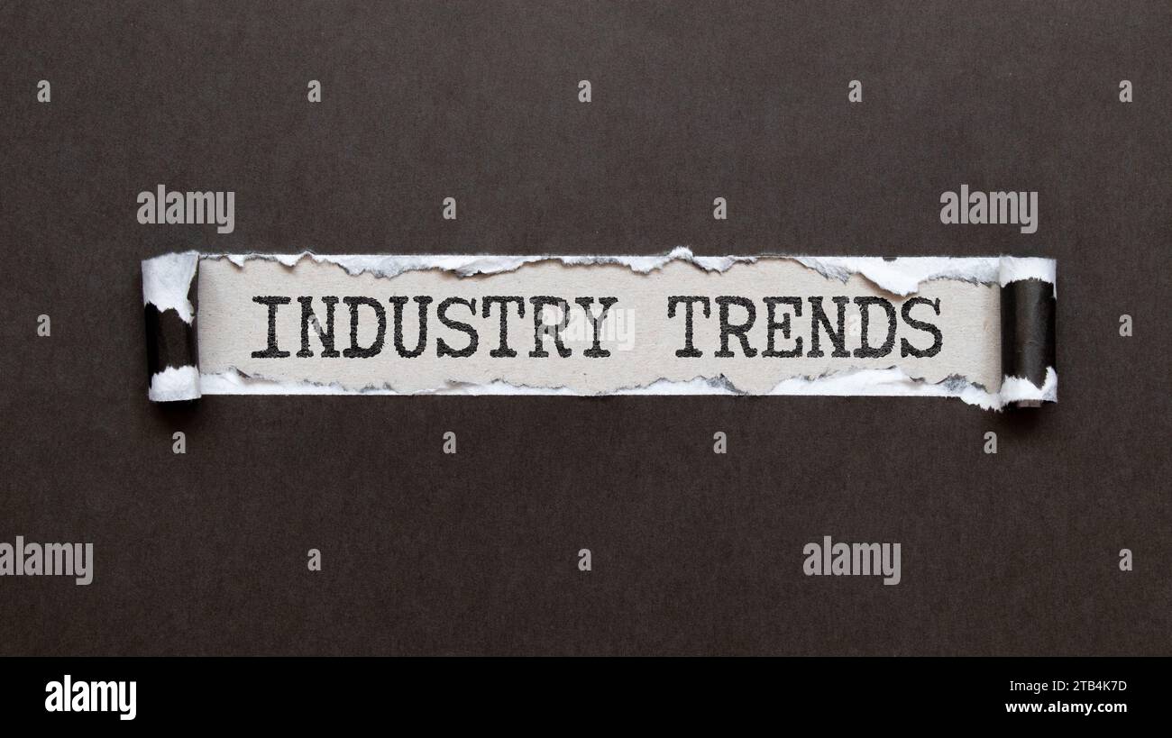 INDUSTRY TRENDS text written on notebook on chart and diagram Stock ...