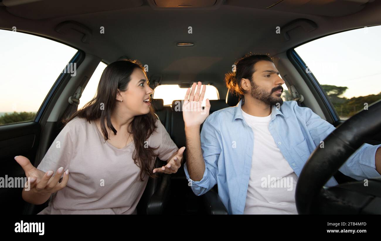Middle eastern couple arguing in car Stock Photo - Alamy