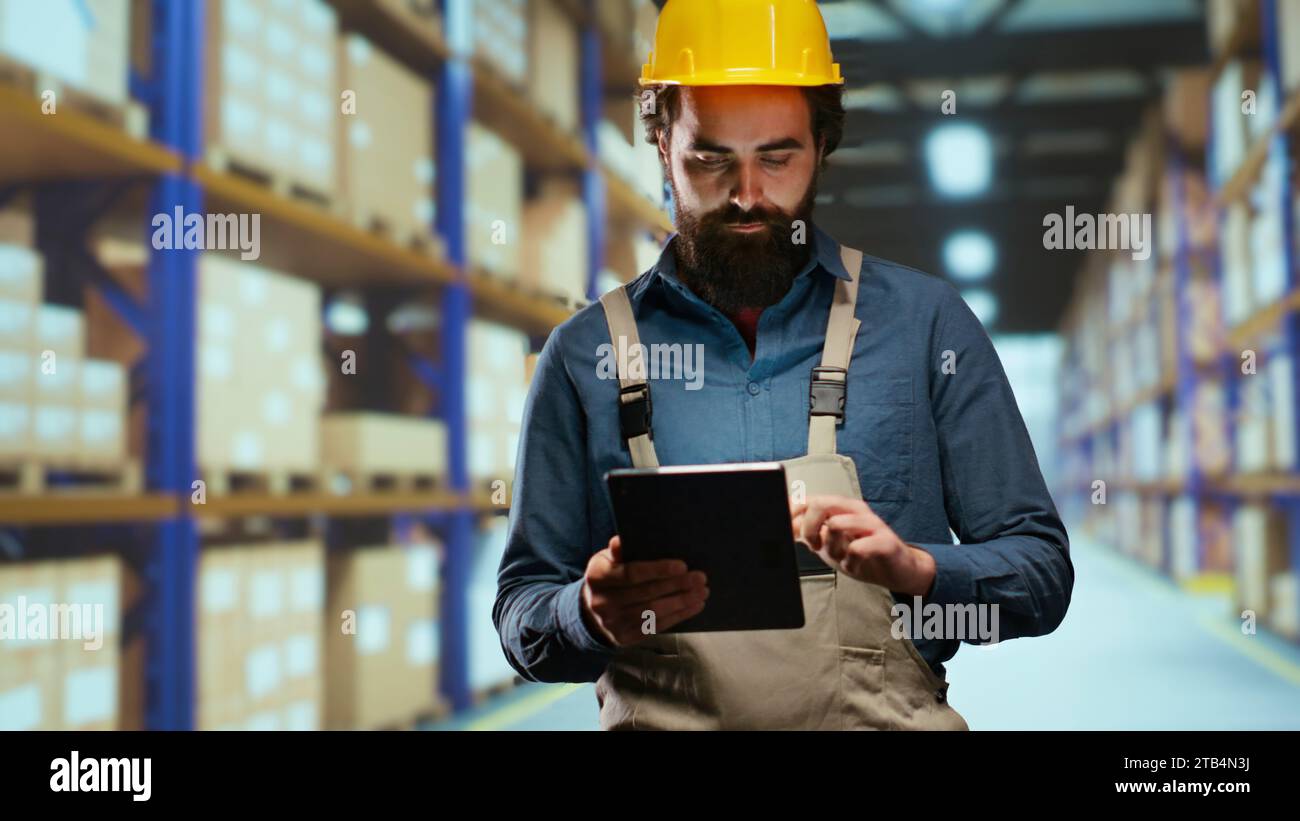 Storage room advisor counting packs of industrial items, checking depot ...