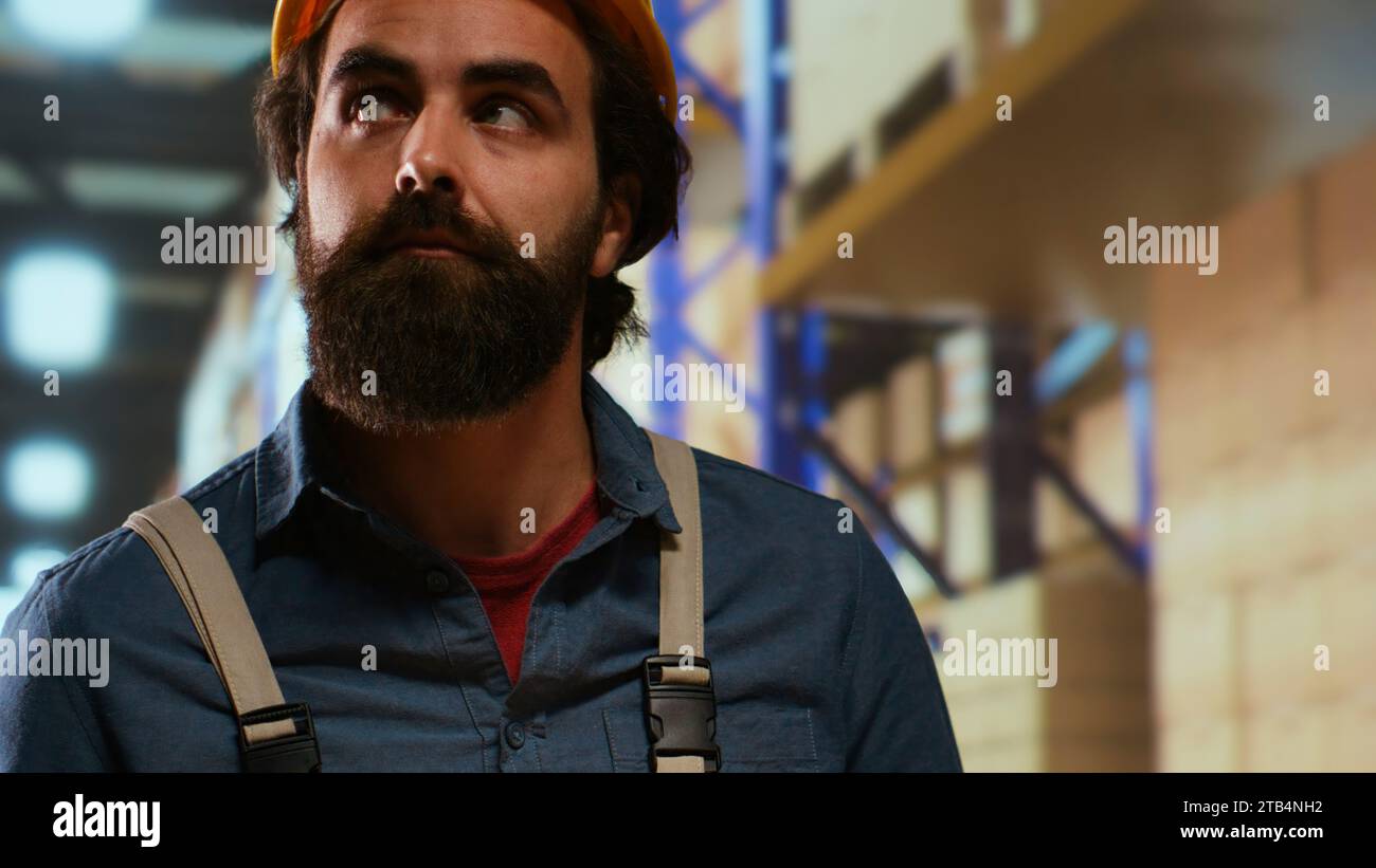 Logistics operator managing movement of materials and stock a warehouse ...