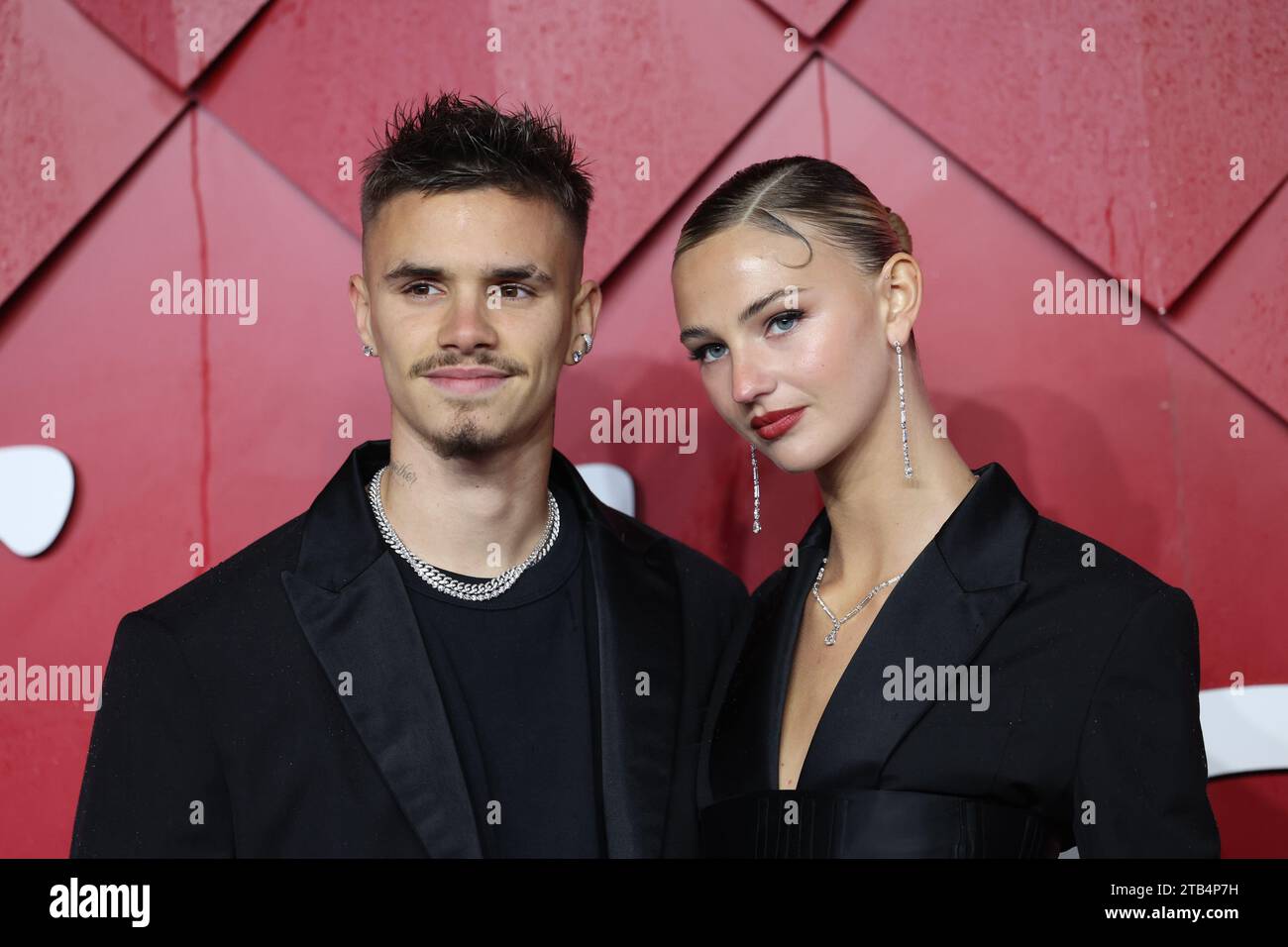 London, UK. December 4th, 2023. Romeo Beckham (L) and Mia Regan ...