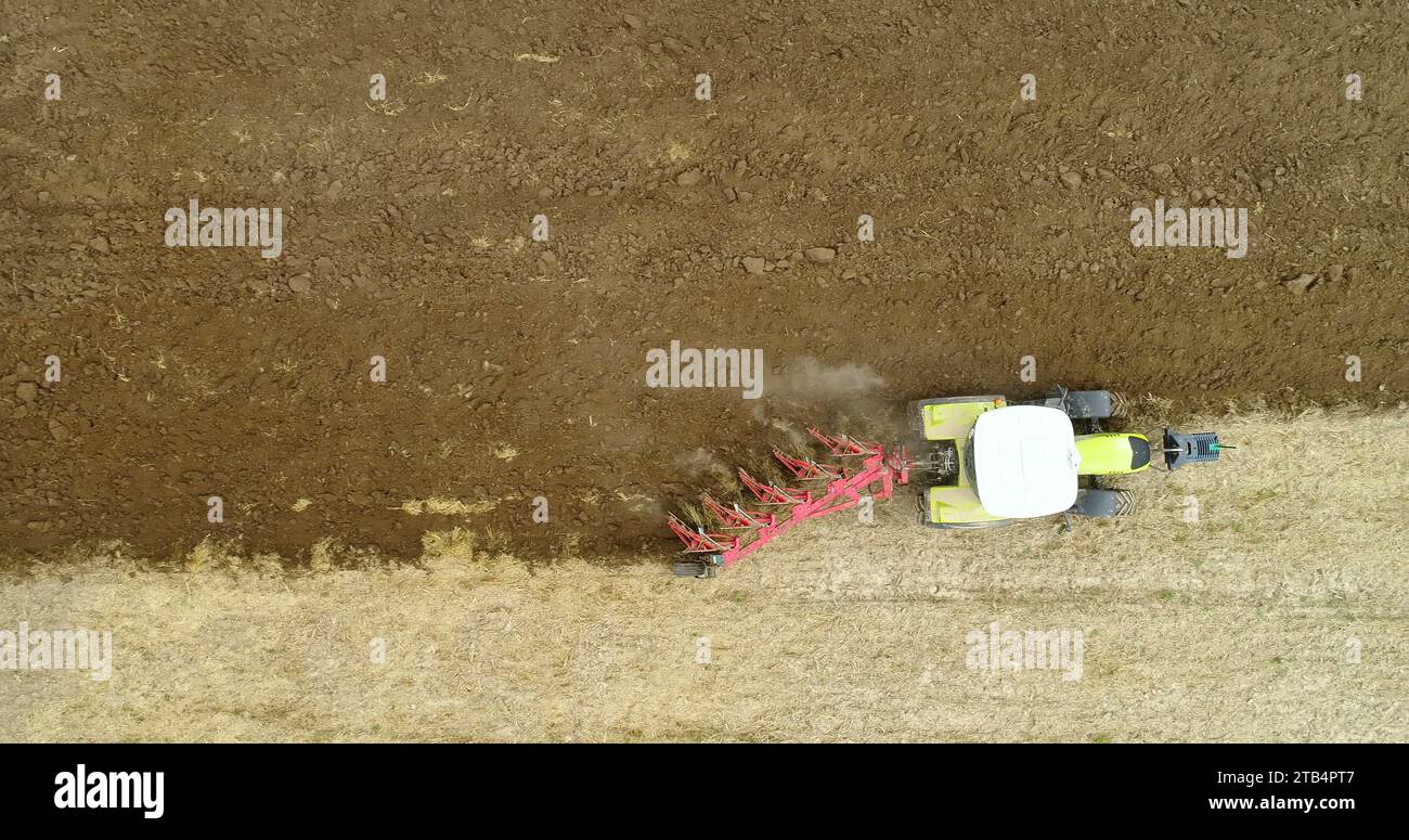 AGRICULTURE - Tractor plowing field 4K Stock Photo - Alamy