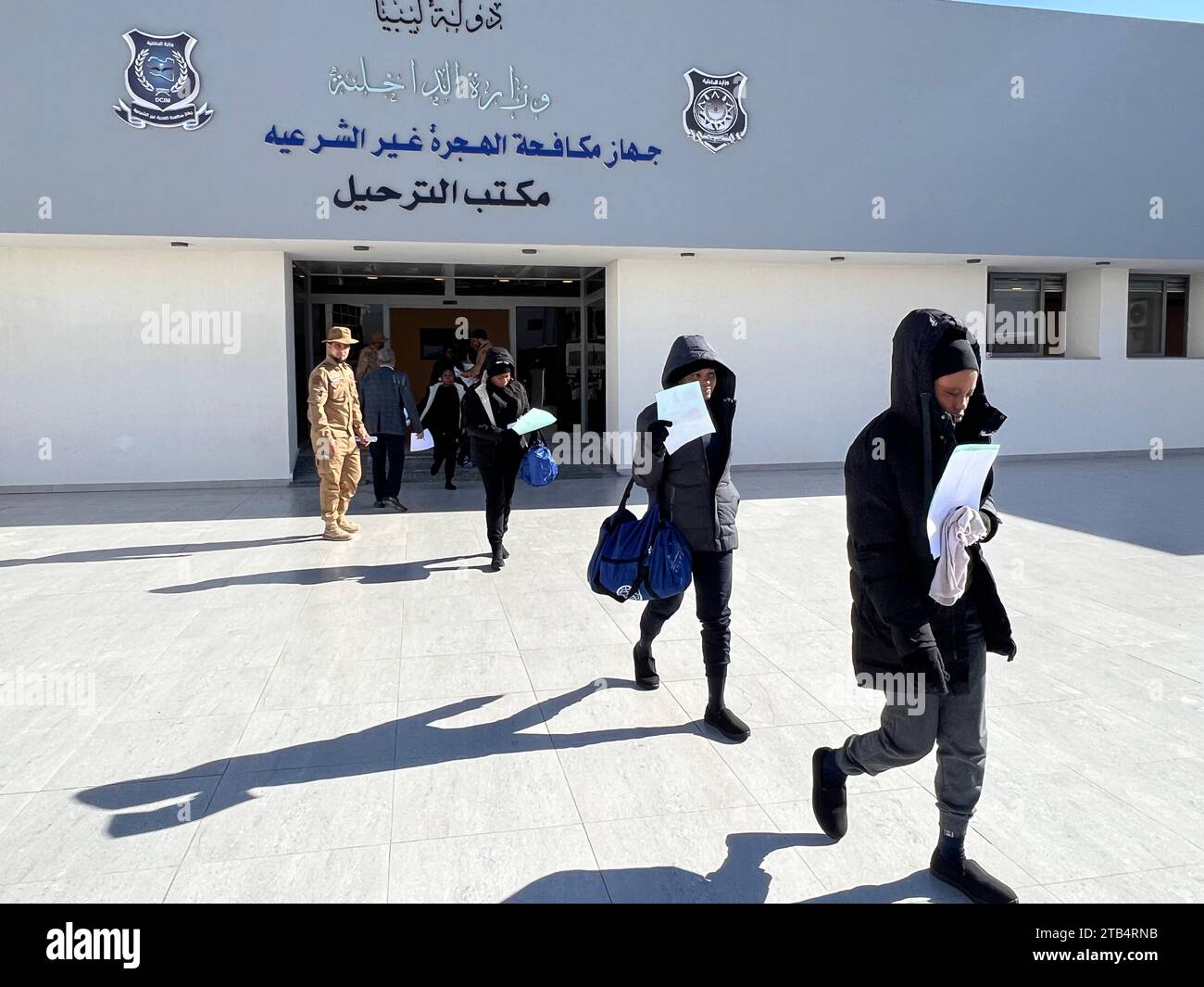 Tripoli, Libya. 4th Dec, 2023. Illegal migrants leave the Libyan Illegal Migration Control ...