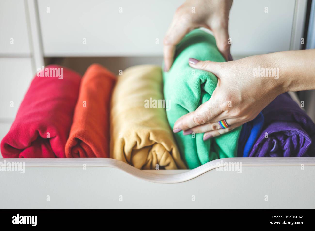The colorful clothes are laid out in the colors of the LGBT flag Stock ...