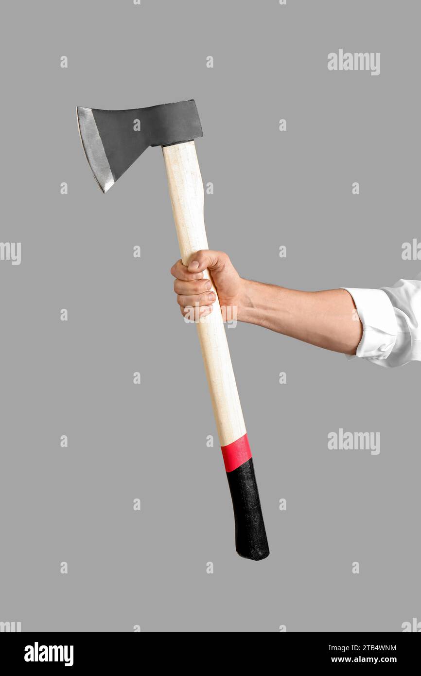 Hand holding axe hi-res stock photography and images - Alamy