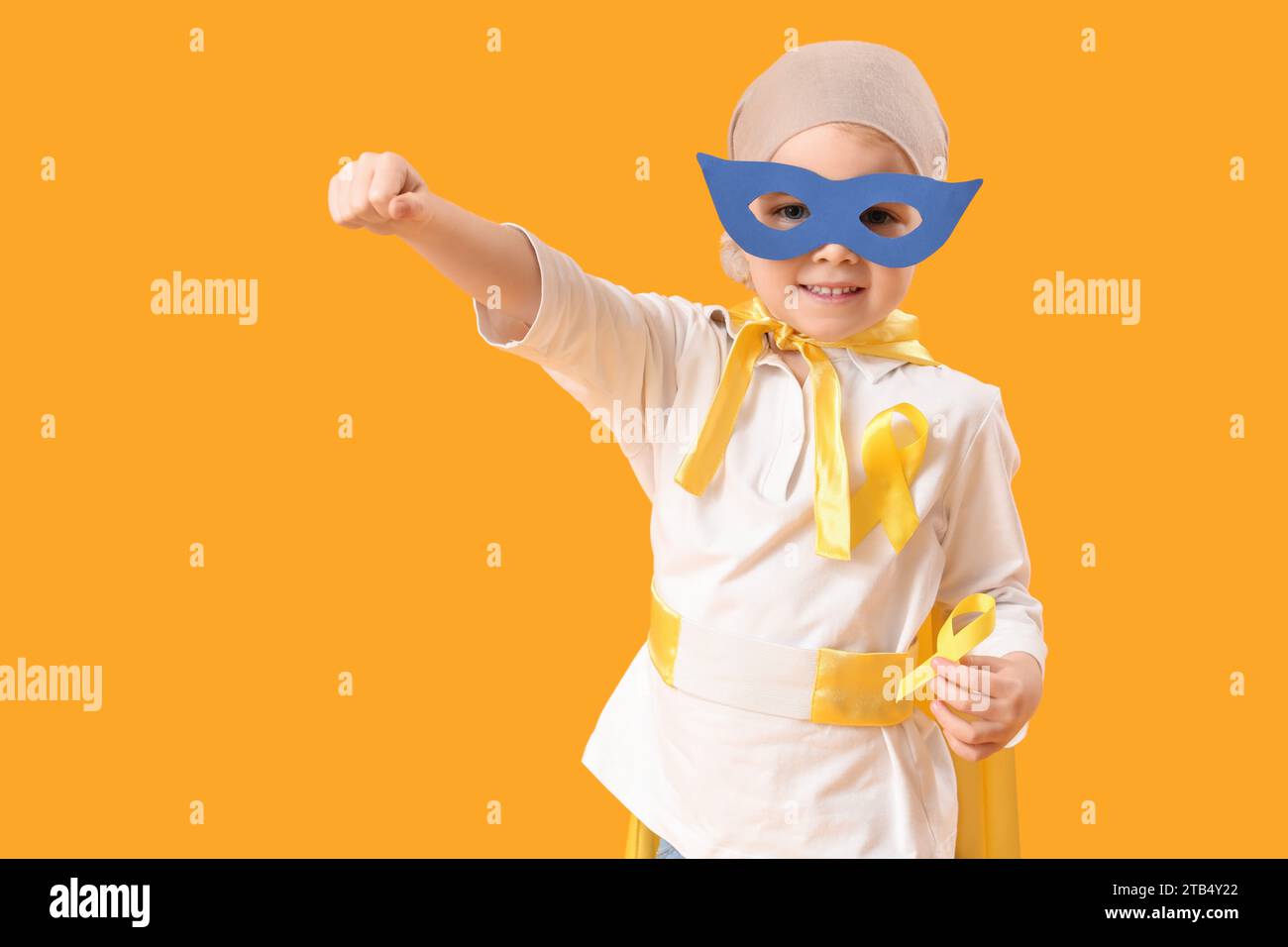 Little girl after chemotherapy dressed as superhero with ribbons on ...