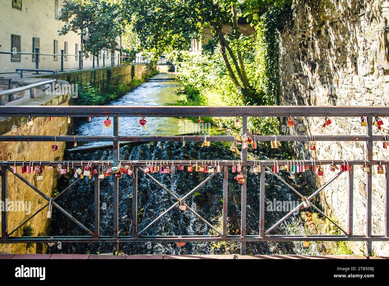 Locks on bridge railings - traditional romantic custom Stock Photo - Alamy