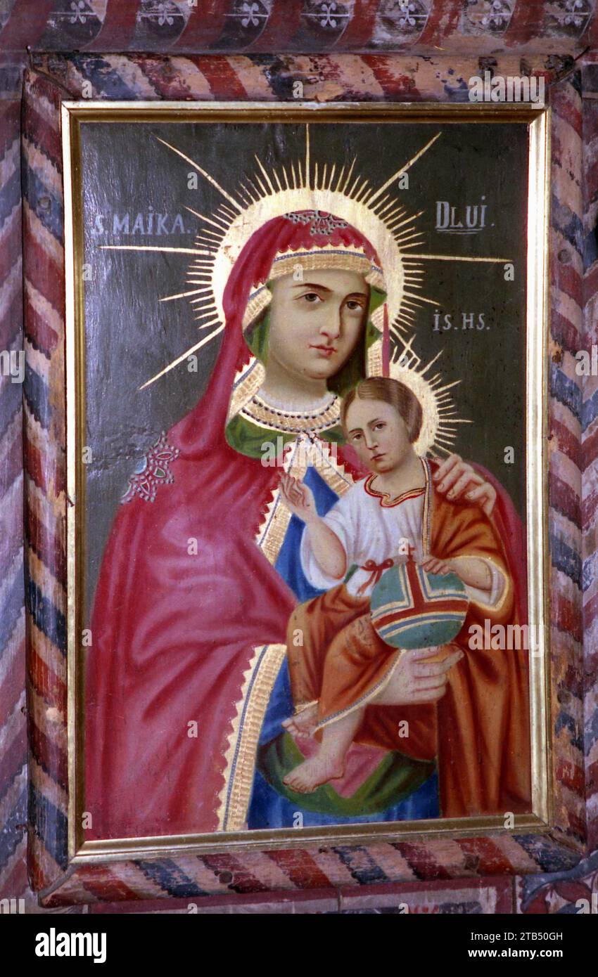 Novaci, Gorj County, Romania, 2001. Old icon depicting the Virgin mary ...