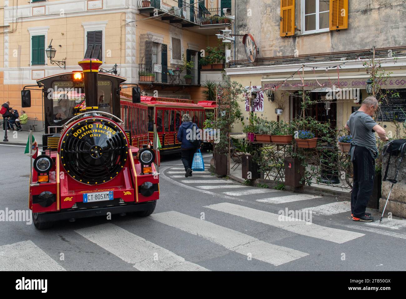 Tourist train in the medieval village of Finalborgo, a short distance ...