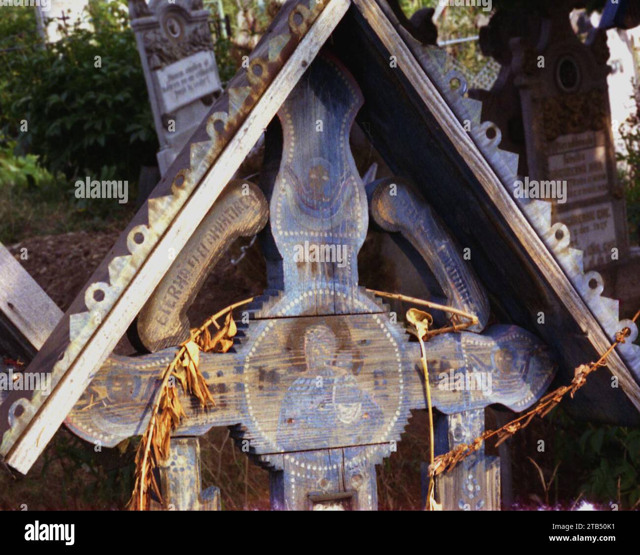 Novaci, Gorj County, Romania, 2001. Old wooden crosses in the cemetery ...