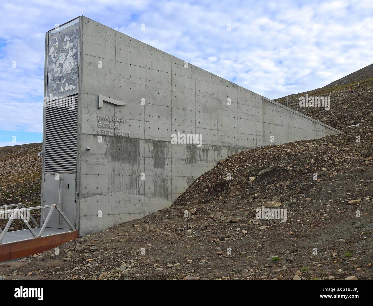 the exterior of the svalbard global seed vault on a rocky mountainside ...