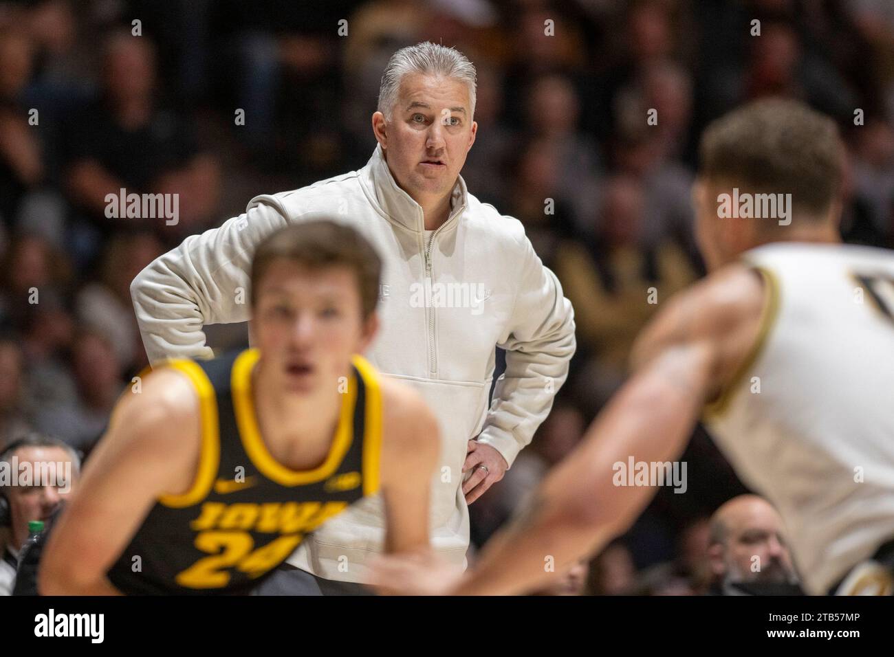 Purdue head coach Matt Painter, top, watches action on the court during ...