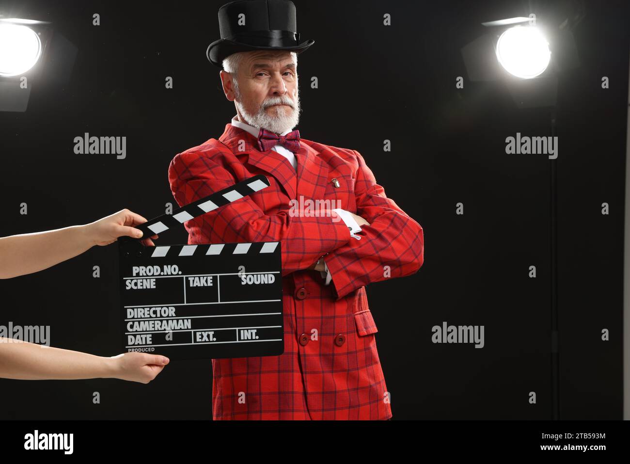 Senior actor performing role while second assistant camera holding ...