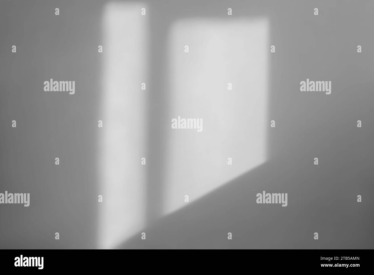 Light and shadow from window on beige wall indoors Stock Photo - Alamy