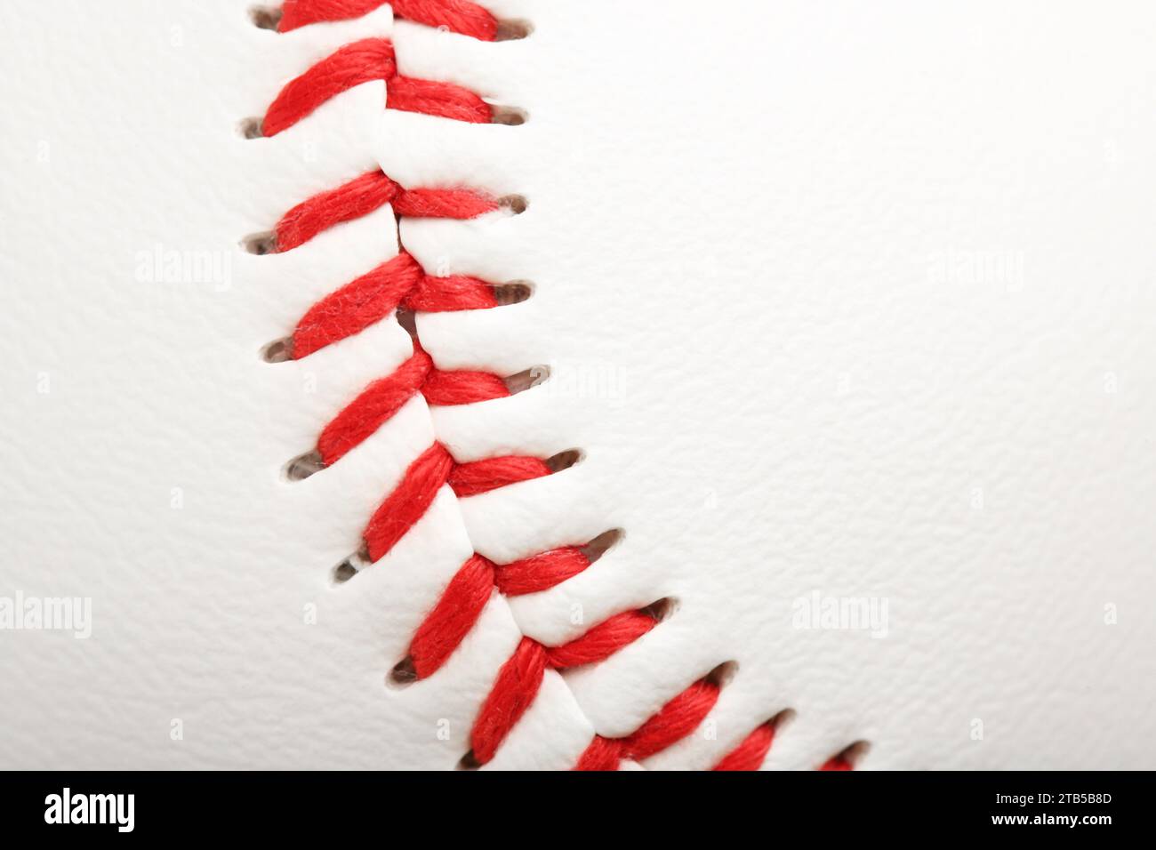 Baseball ball with stitches as background, closeup Stock Photo - Alamy