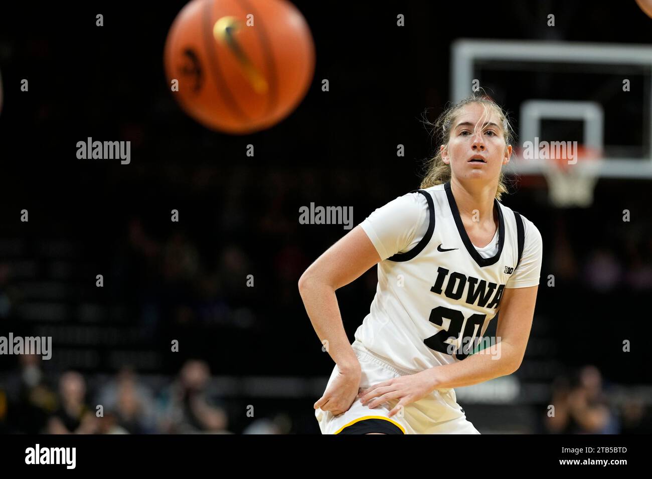 Iowa guard Kate Martin (20) throws a pass during the first half of an ...
