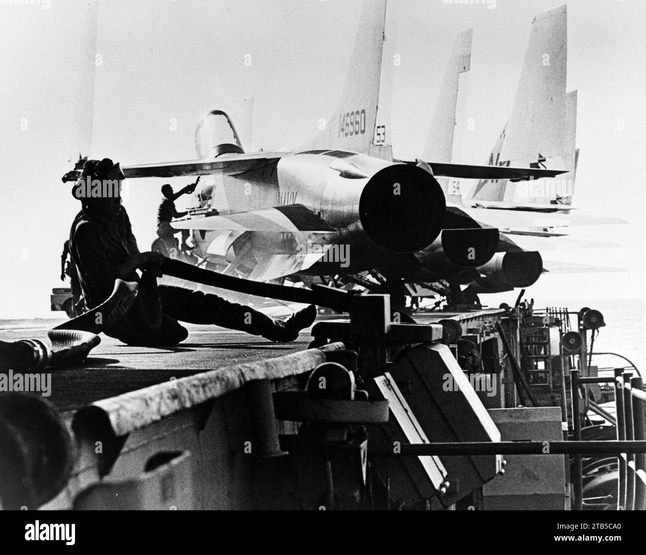 Vought F-8C Crusaders of VF-24 are refueled aboard USS Bon Homme ...