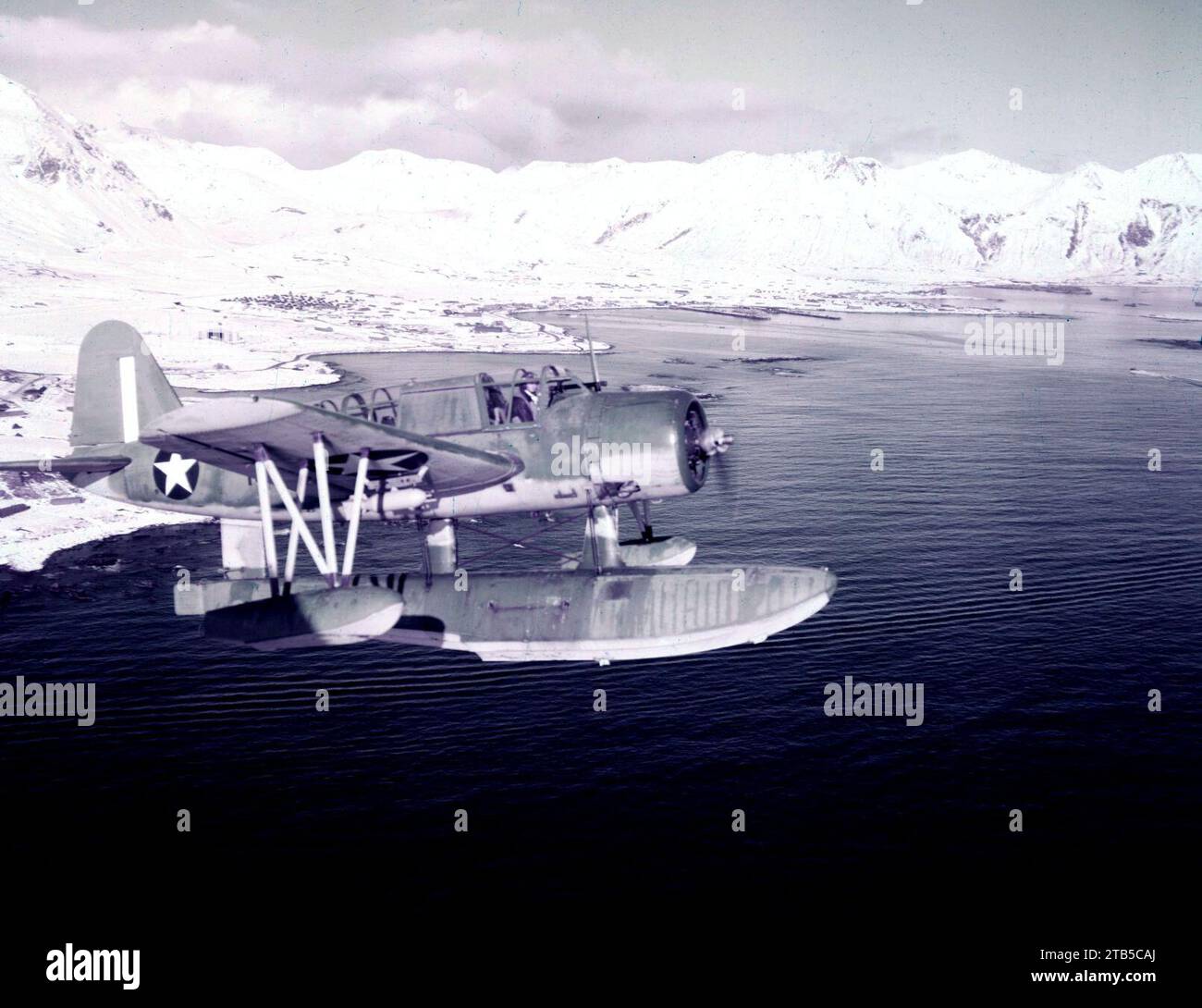 Vought OS2U Kingfisher of VS-56 in flight over Massacre Bay Area, Attu ...