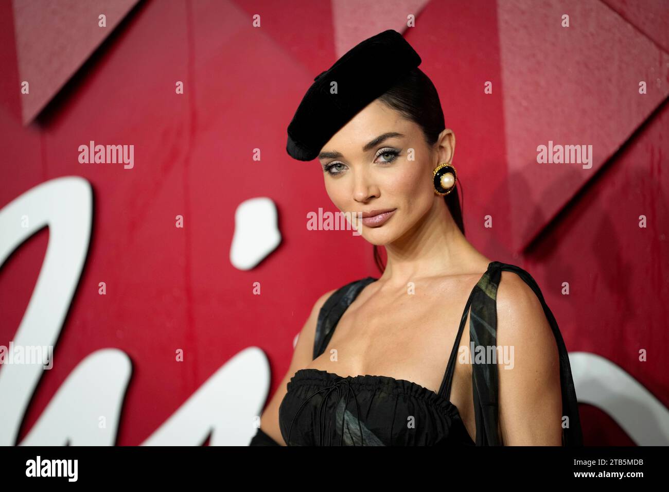Amy Jackson poses for photographers upon arrival at the British Fashion ...