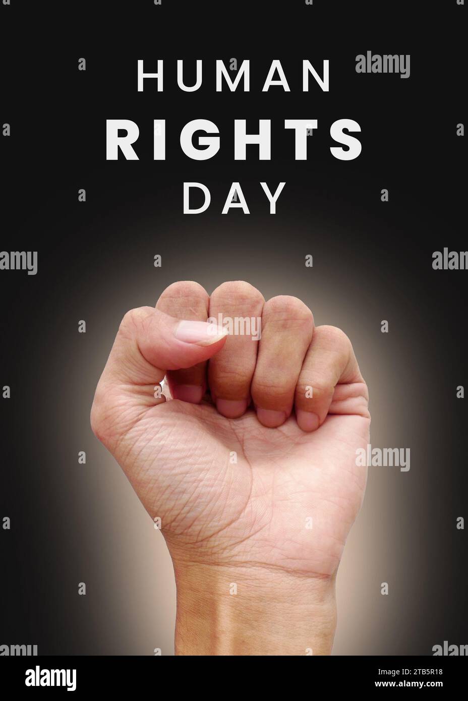 Human Rights Day on December 10. A man's hands are tied with a rope ...