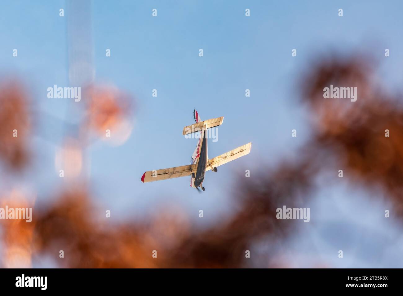 Small ultralight airplane with overhead wing and single propeller ...