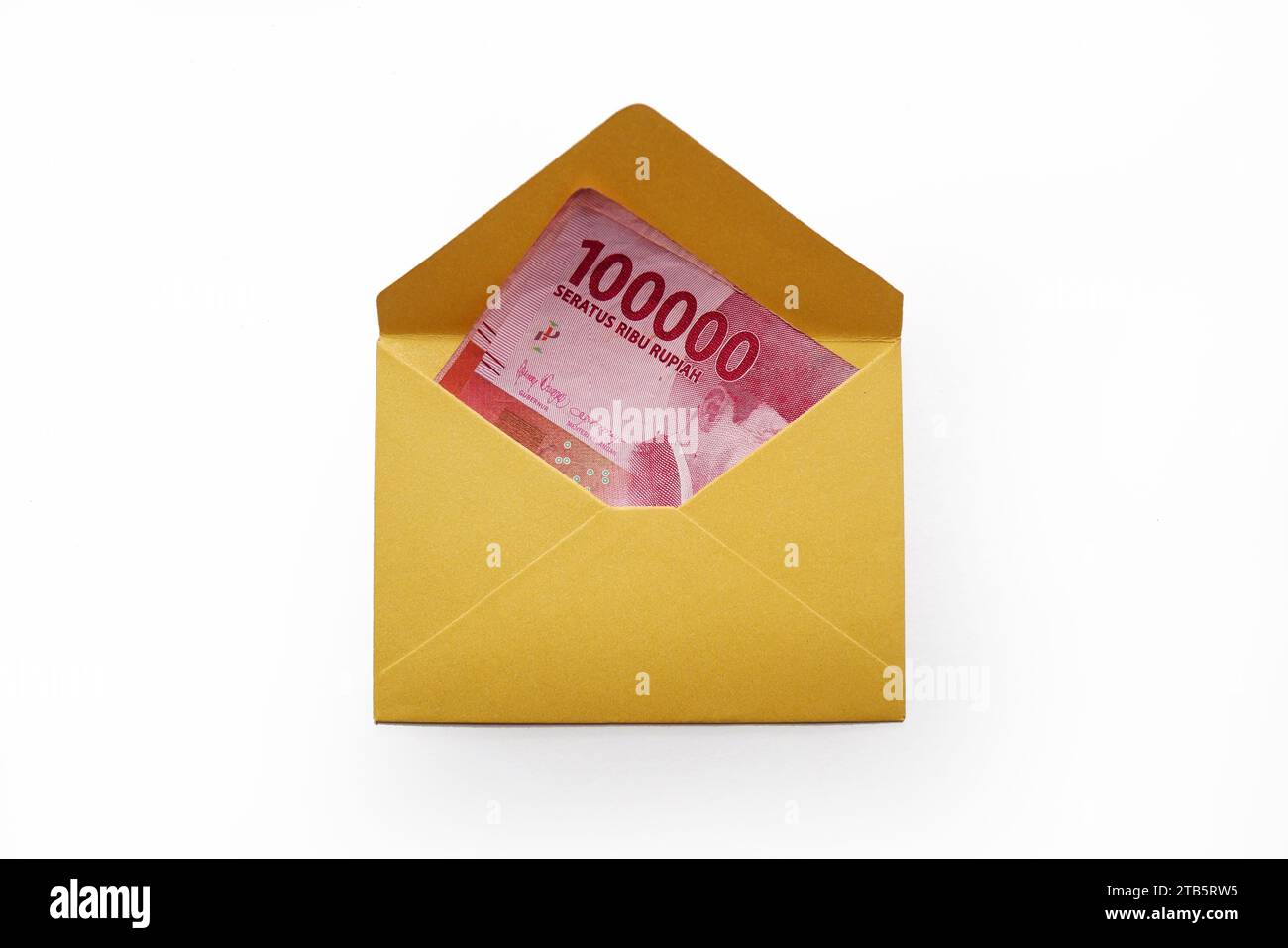 Money in an envelope on a white background. Rupiah is the currency of ...