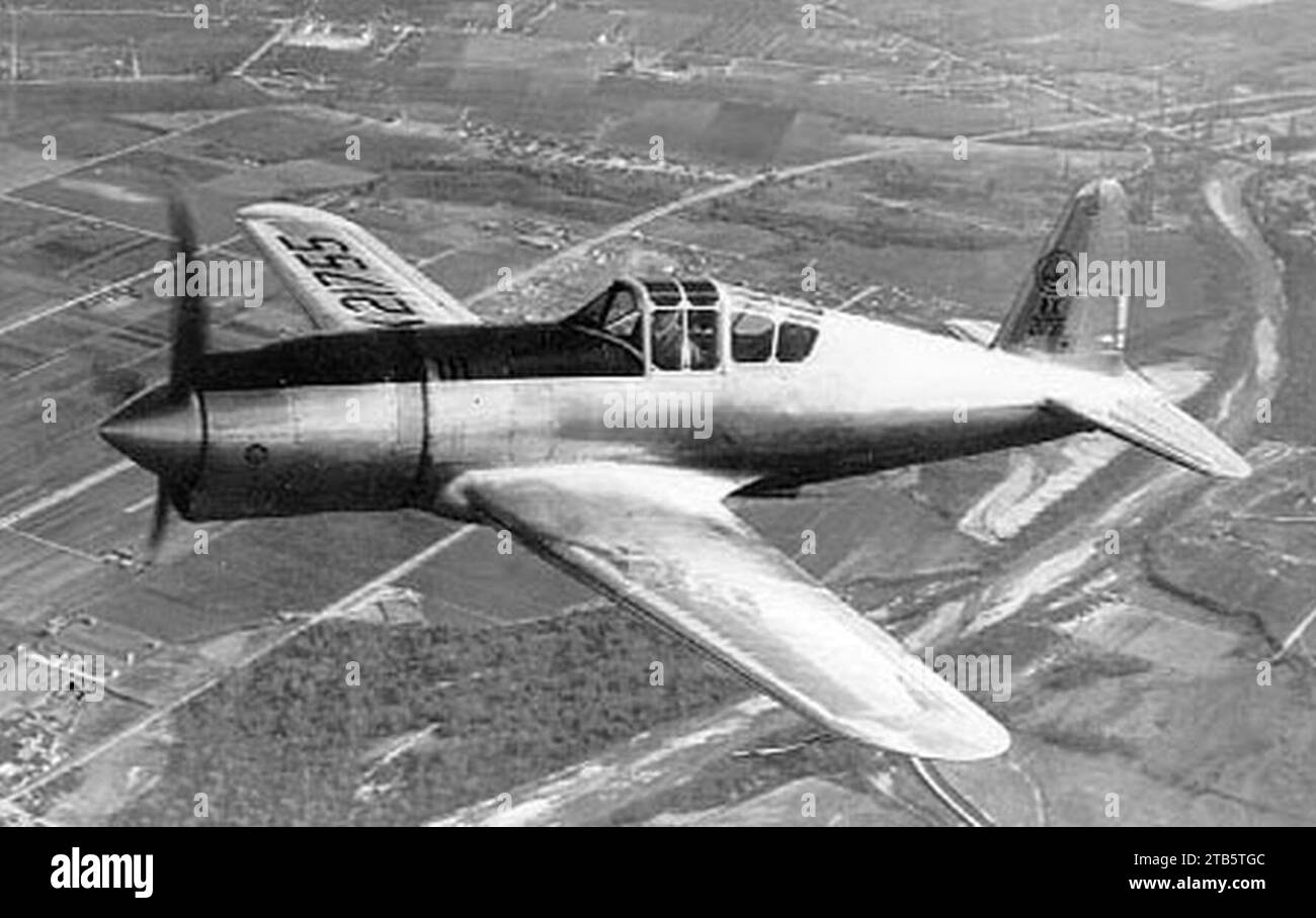 Vultee P-66 Vanguard, Model 48 in flight with original long nose ...