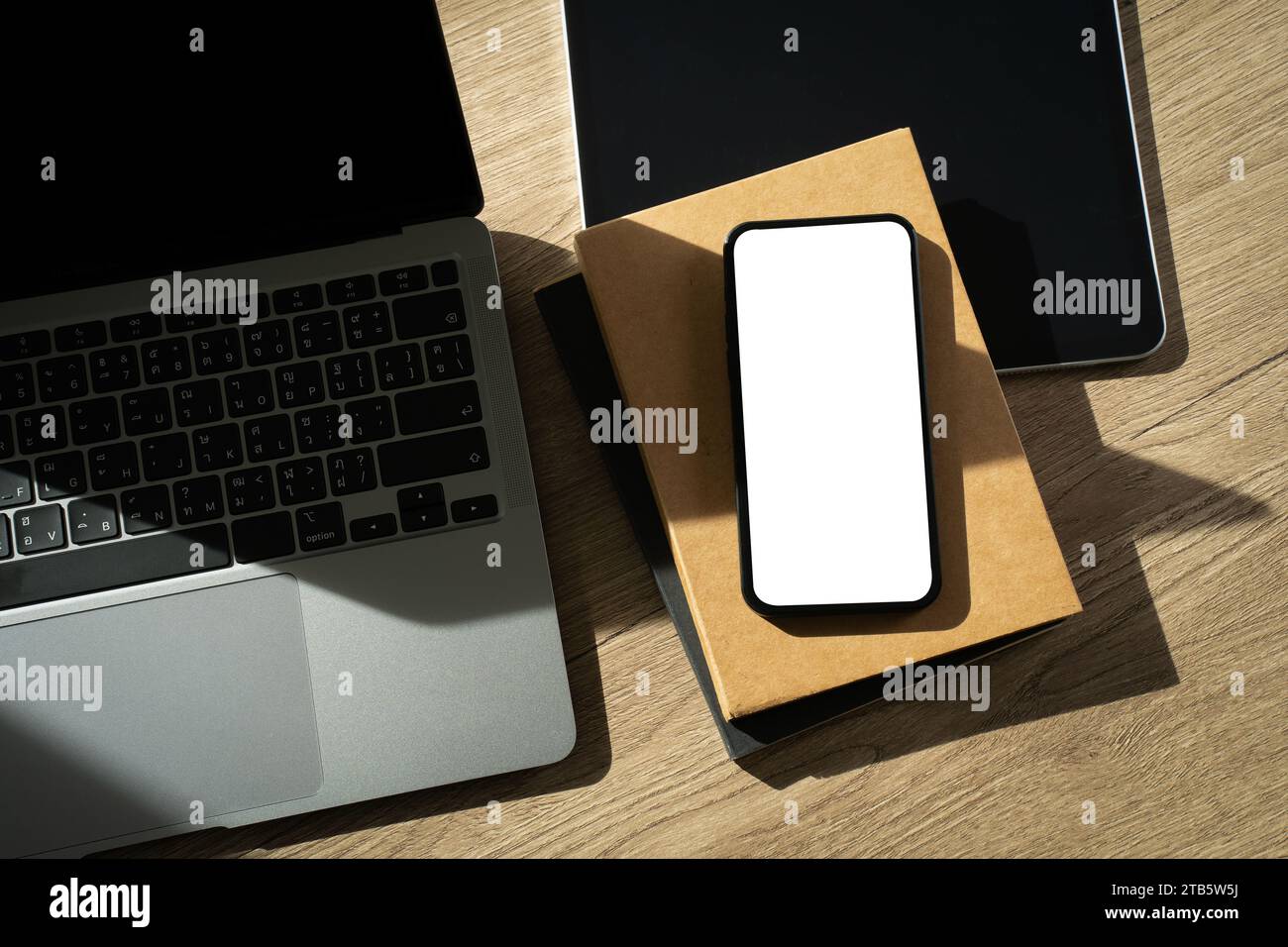 smart mobile phone blank screen display device on table Mockup for the ...