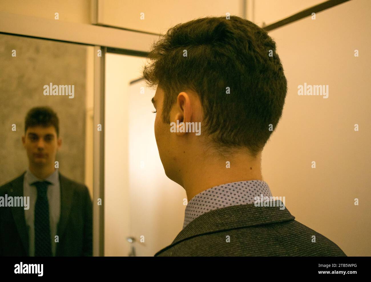 Suit from behind man hi-res stock photography and images - Alamy