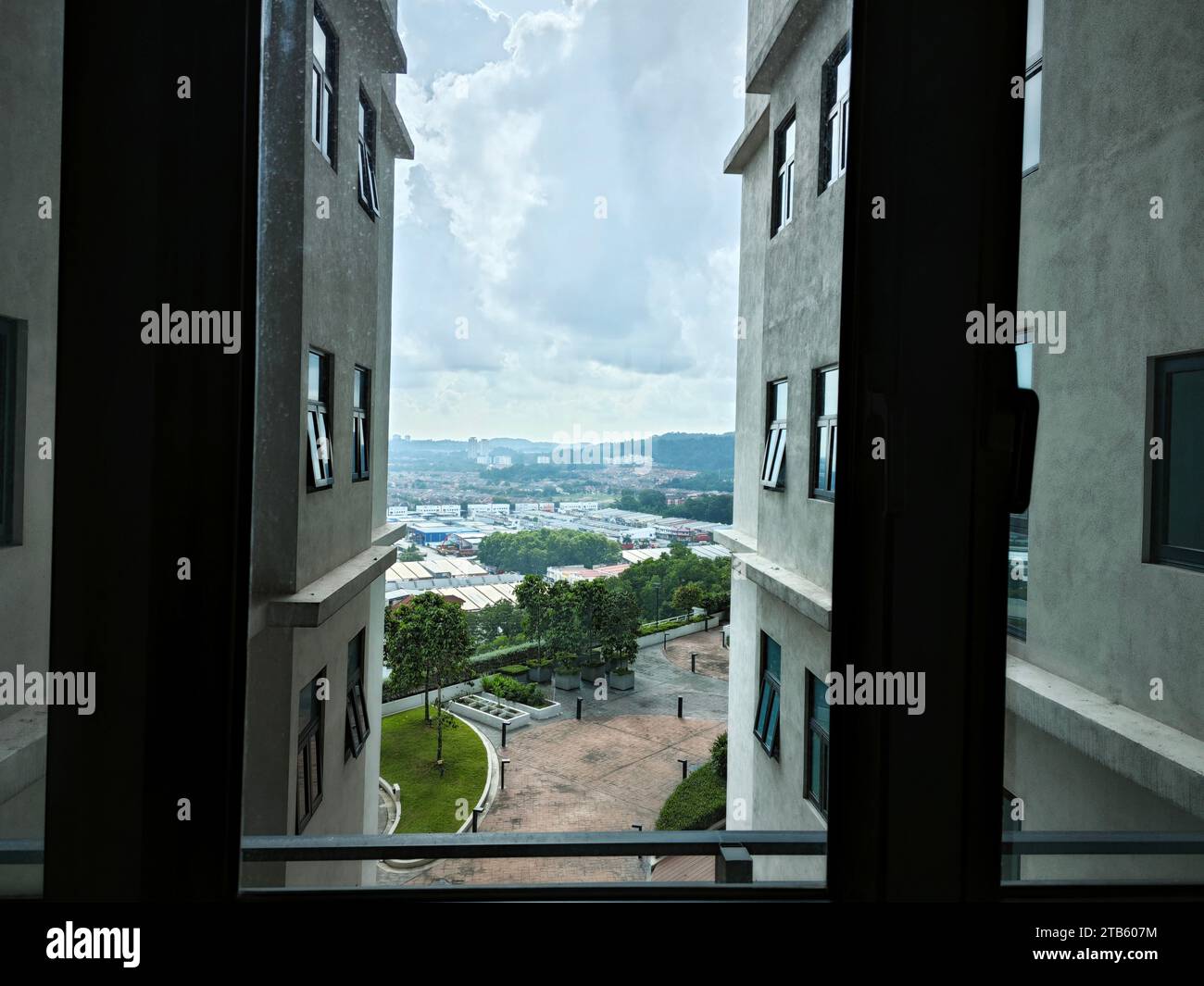 looking out the window frame from high building toward the distance ...