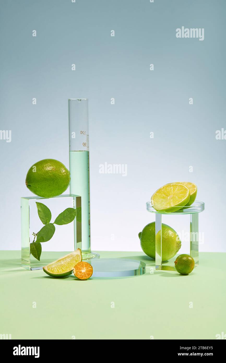 Scientific-themed display with lab equipment, a beaker, glass podiums ...