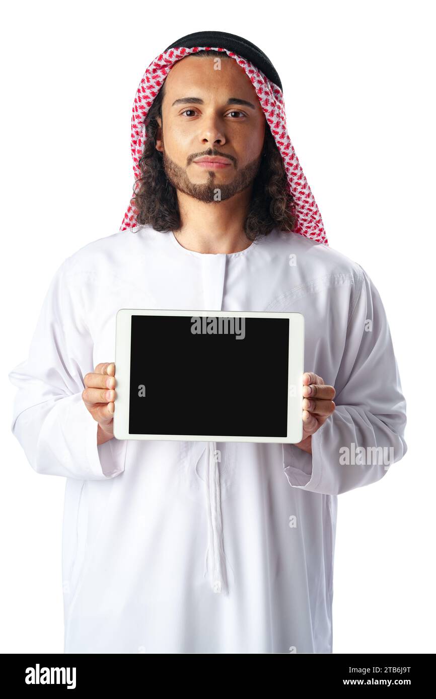 Young Arab man in traditional dress thobe showing digital tablet with ...