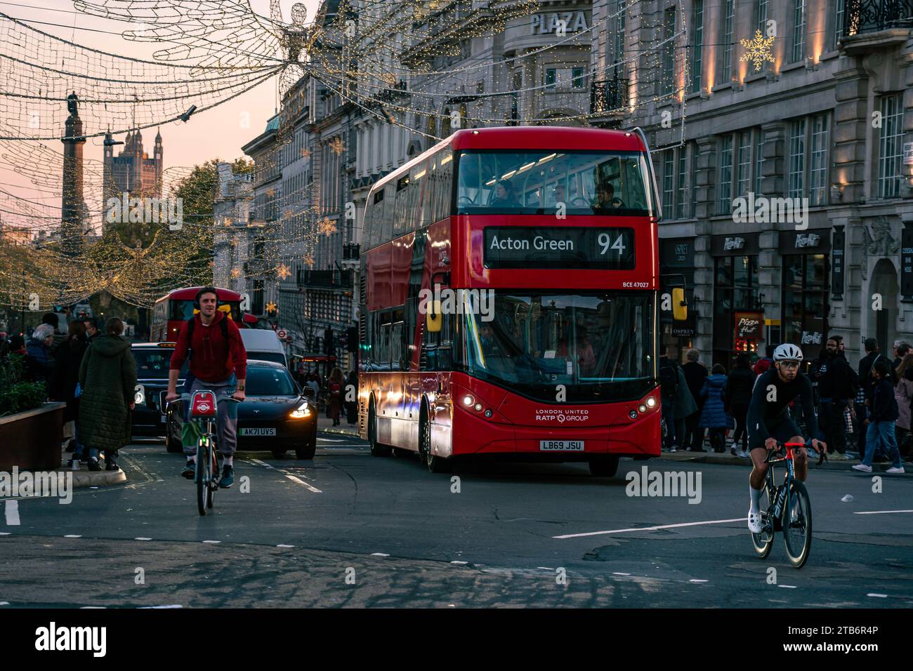Everyday life scene in London, double decker, cars and cyclists Stock ...