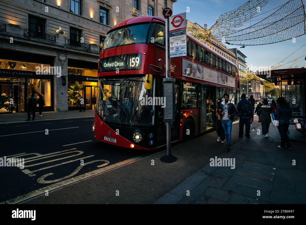 Everyday life scene in London, double decker, cars and cyclists Stock ...
