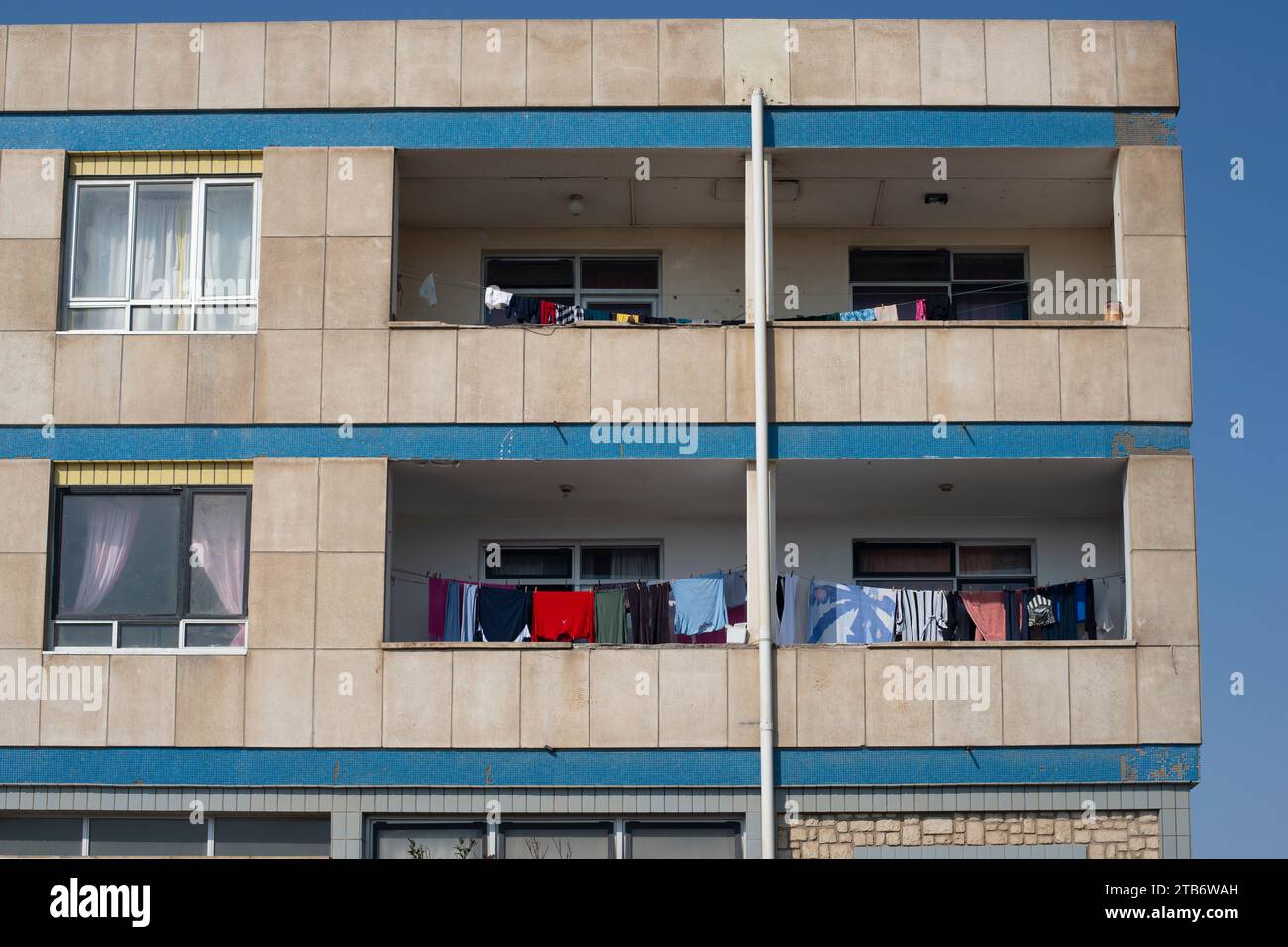 residential building exterior with drying clothes on balcony Stock ...