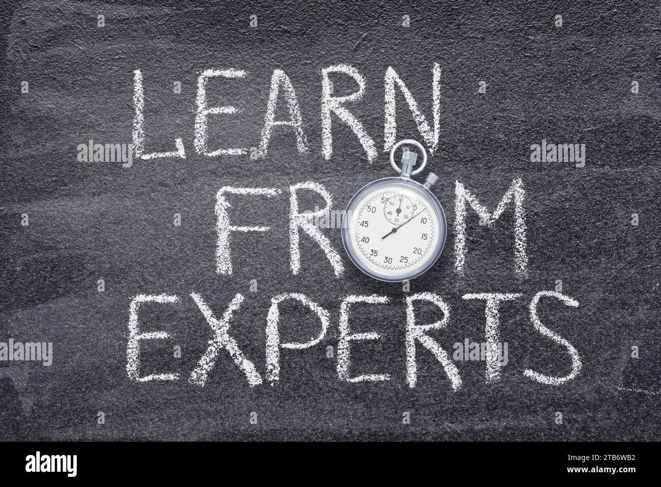 learn from experts phrase written on chalkboard with vintage precise stopwatch Stock Photo - Alamy