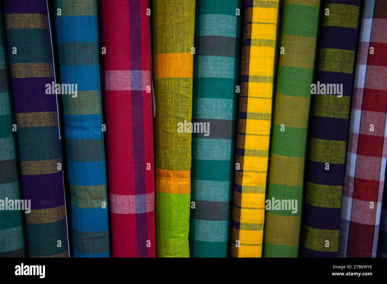Multicolor Traditional Bangladeshi men's wear lungi folded on a rack in ...