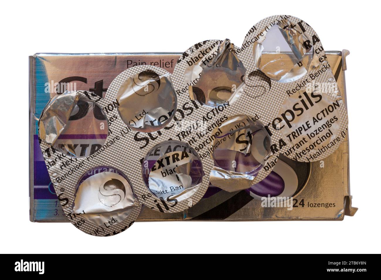 Packet of Strepsils extra triple action blackcurrant lozenges pain ...