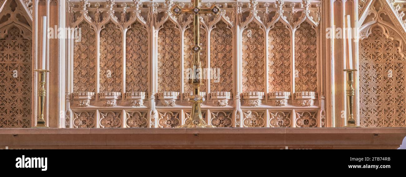 Ornate stone reredos behind the high altar in the medieval cathedral at ...