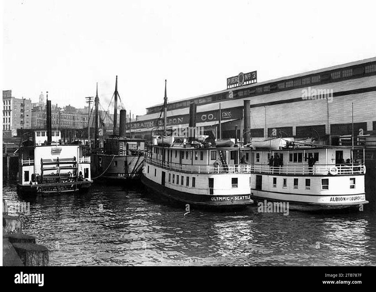 Waterfront at Pier 3 with several steamboats, Seattle Stock Photo - Alamy