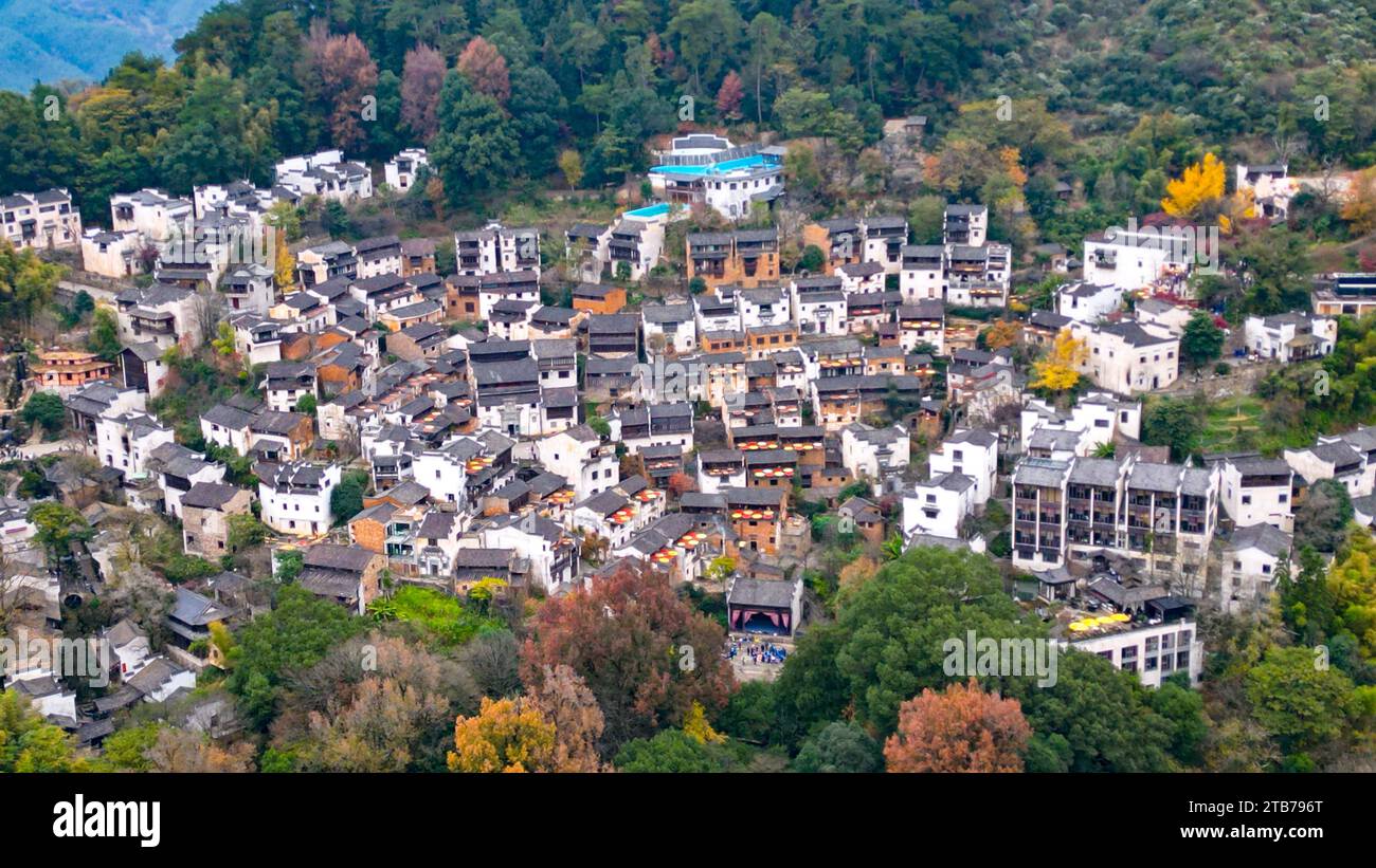 SHANGRAO, CHINA - DECEMBER 3, 2023 - Villagers dry crops and red pepper ...