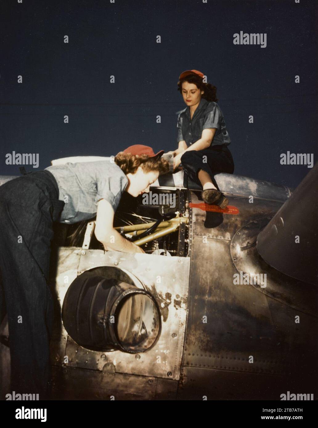 WAVES working on an R-2000 engine of a Douglas R5D at Naval Air Station ...