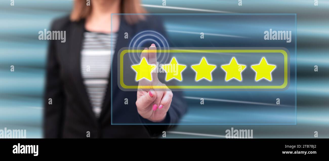 Woman touching a quality concept on a touch screen with her fingers ...